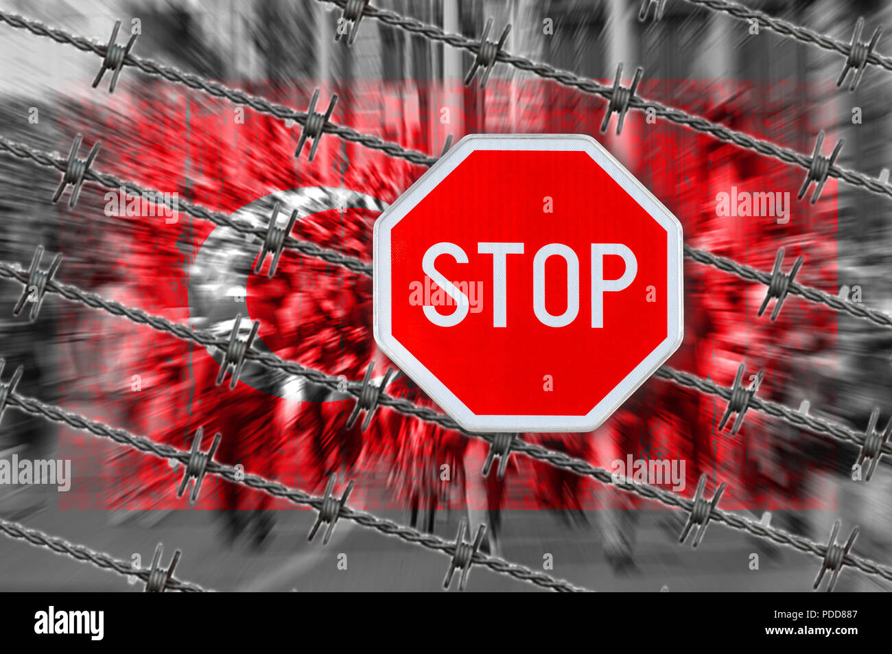 Turkey flag, STOP sign, migrants and barb wire with pliers Stock Photo ...