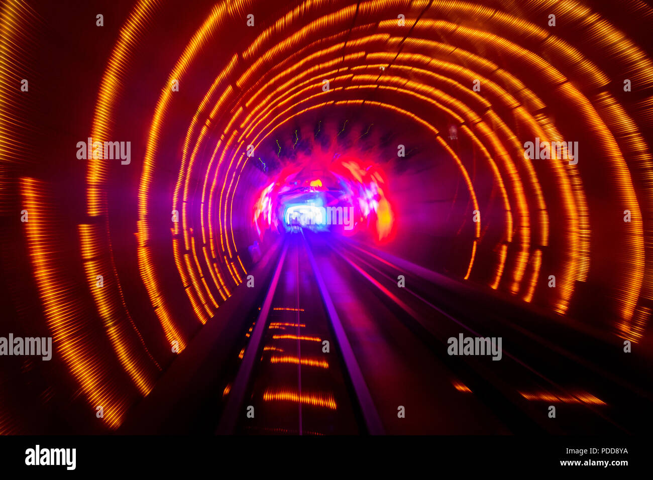 Light streaks. Long exposure from train passing through Bund Sightseeing Tunnel in Shanghai ...
