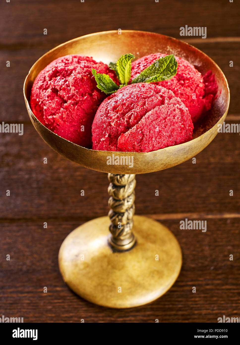 raspberry ice cream with a Cup Stock Photo - Alamy