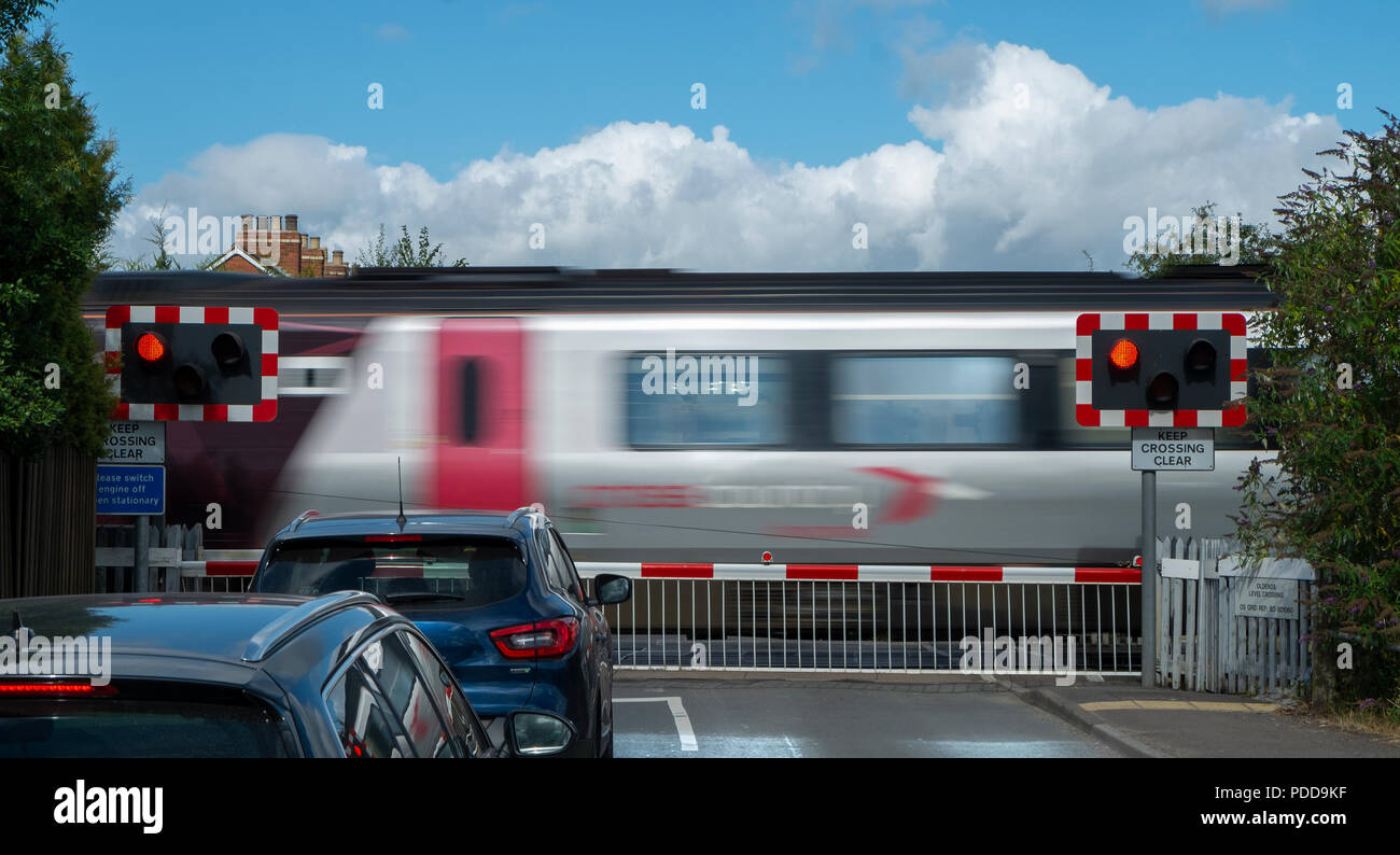 Railway Crossing, Stonehouse, Gloucestershire, UK. Drivers wait at a ...