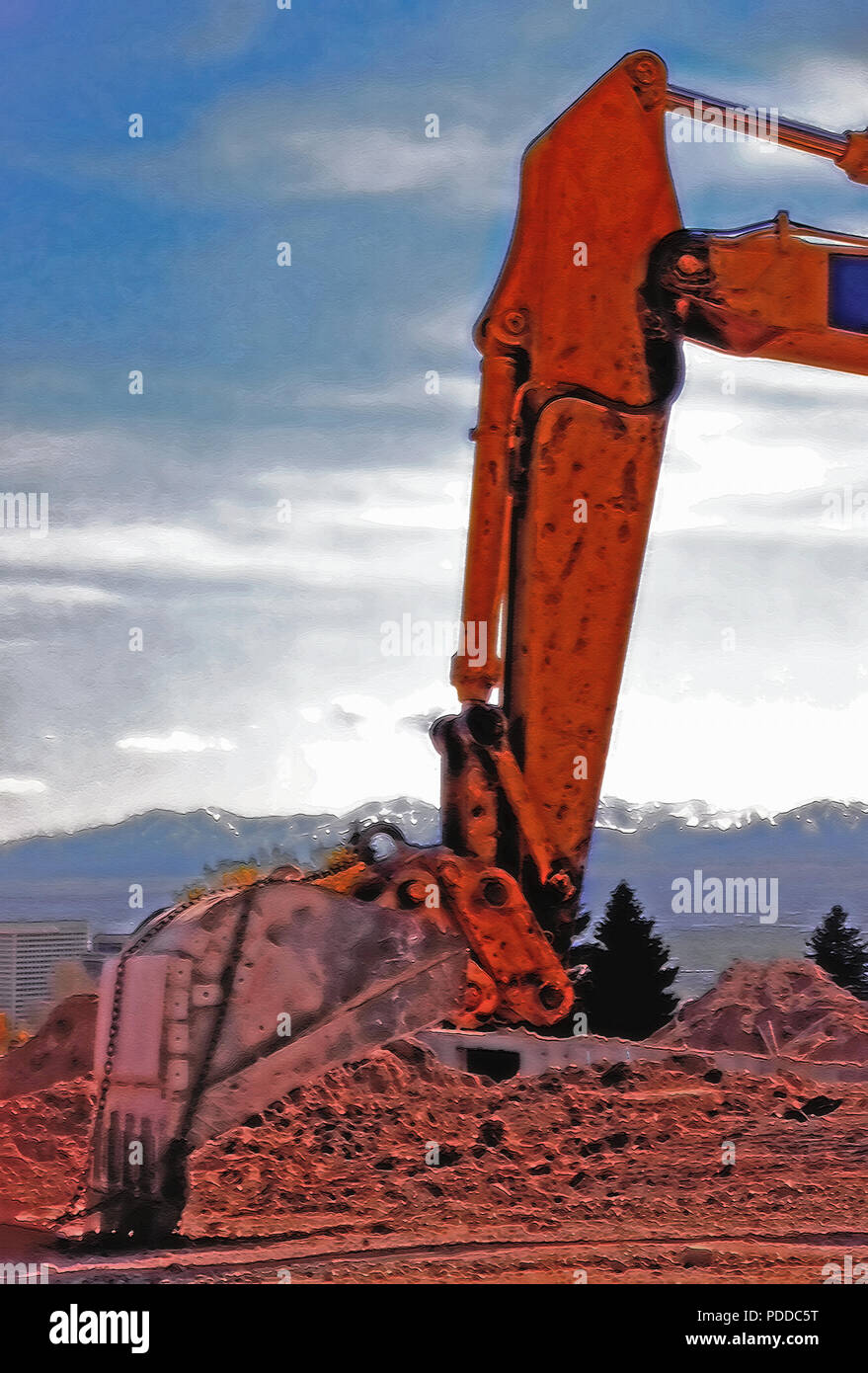 A close up view of a backhoe shovel sitting in a new construction zone ...
