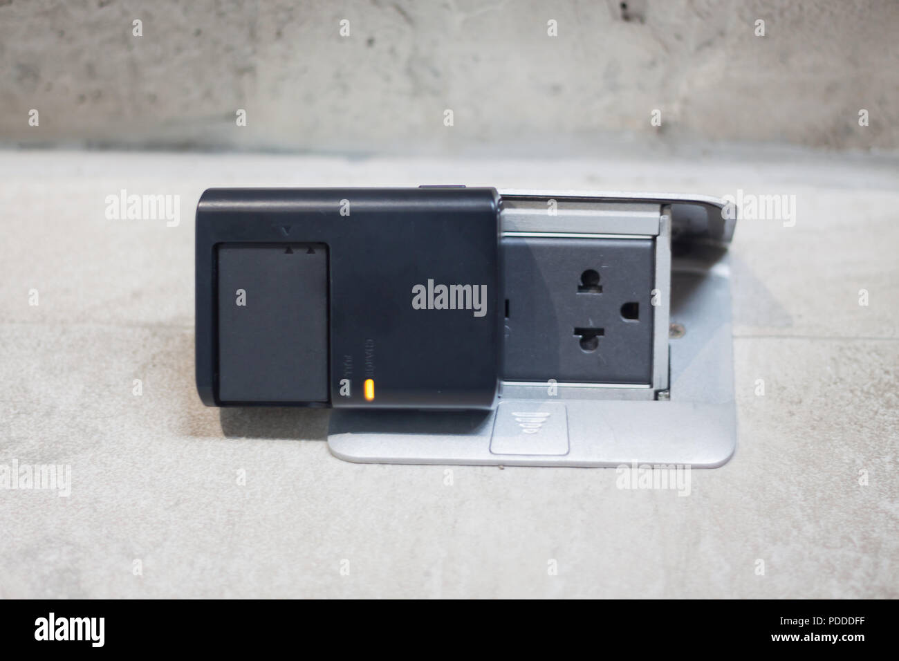 Charging battery on the floor, stock photo Stock Photo - Alamy