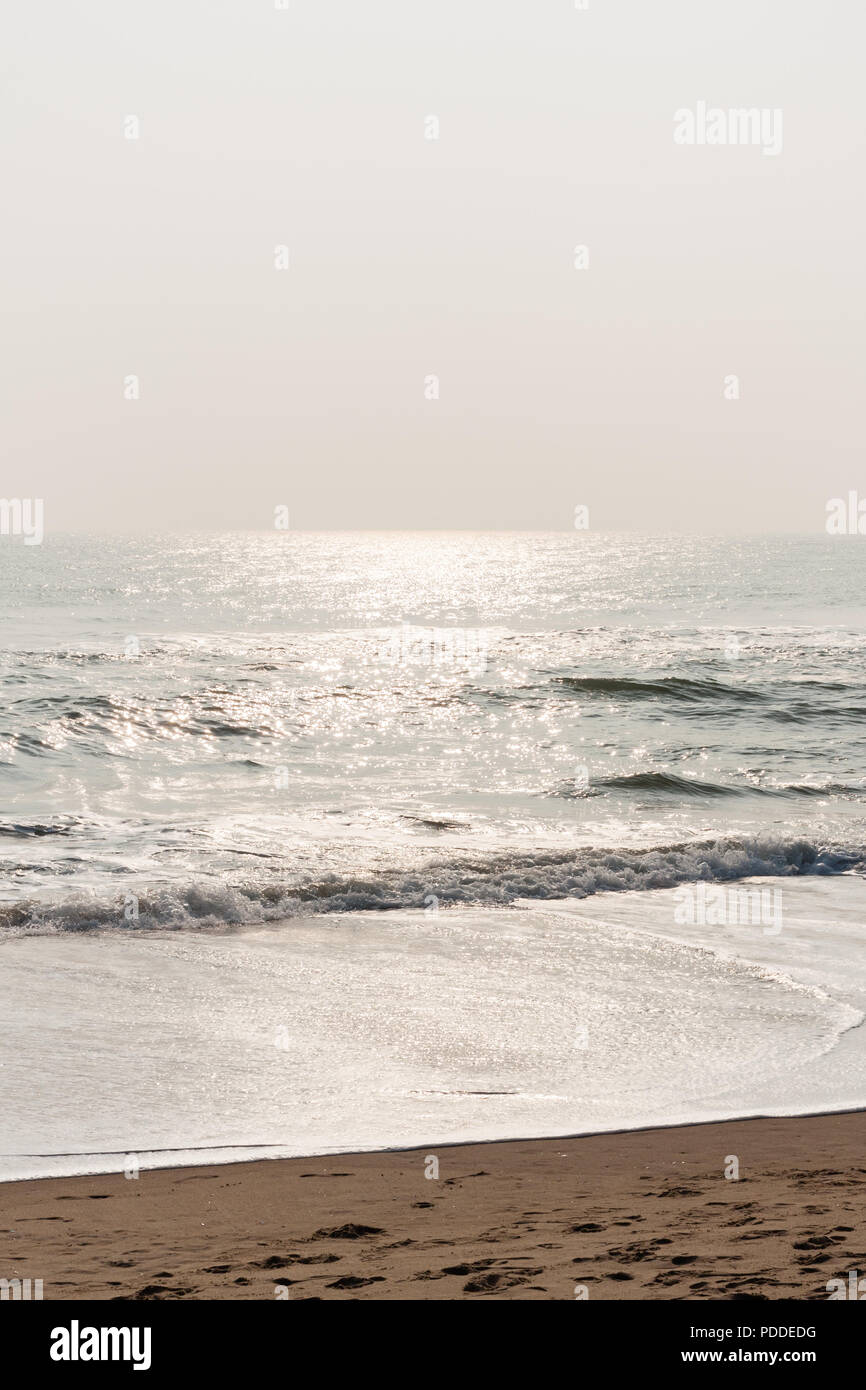 Glistening water on beach - Morning time on a tropical beach with ...