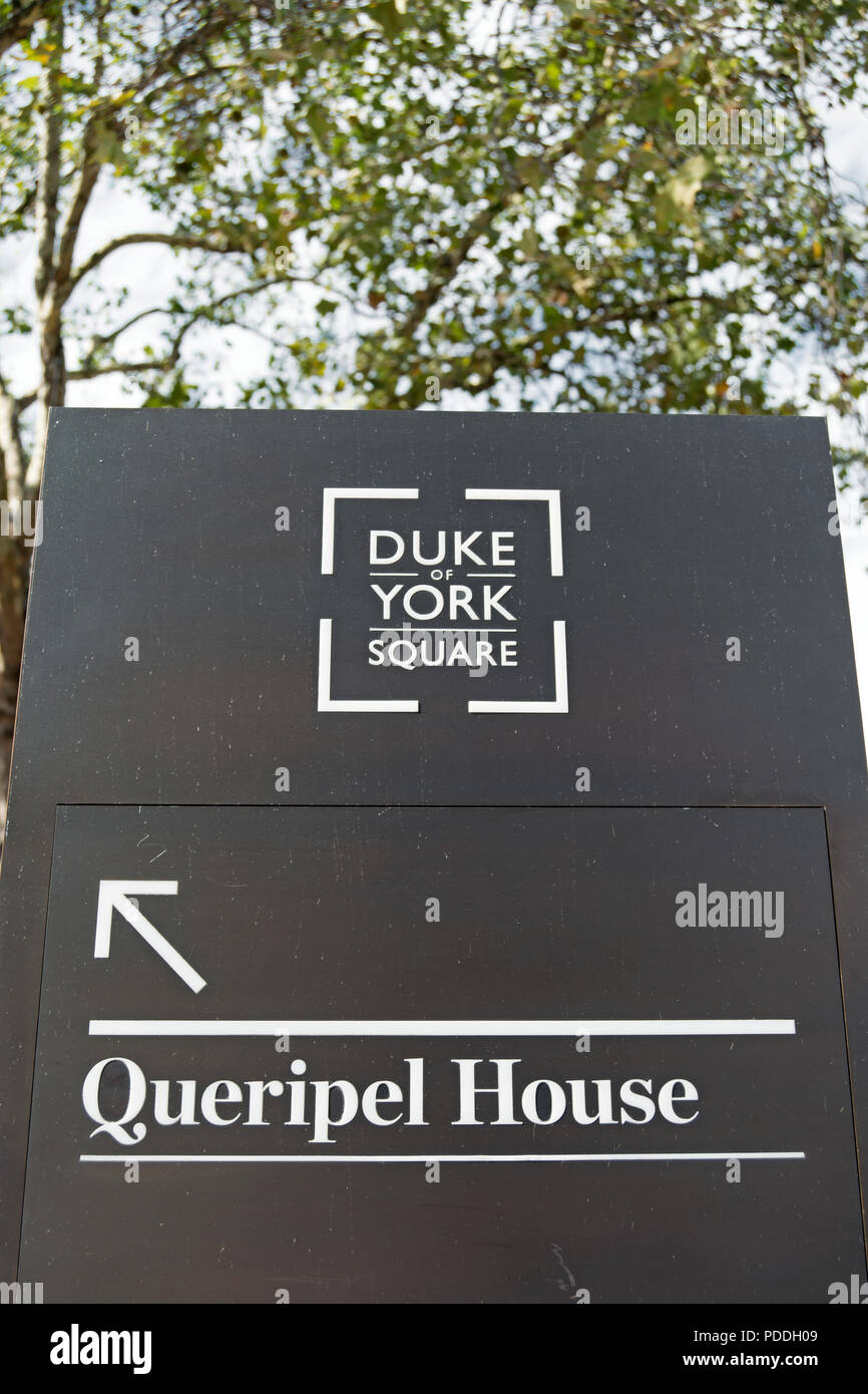sign at duke of york square, chelsea, london, england, with arrow ...