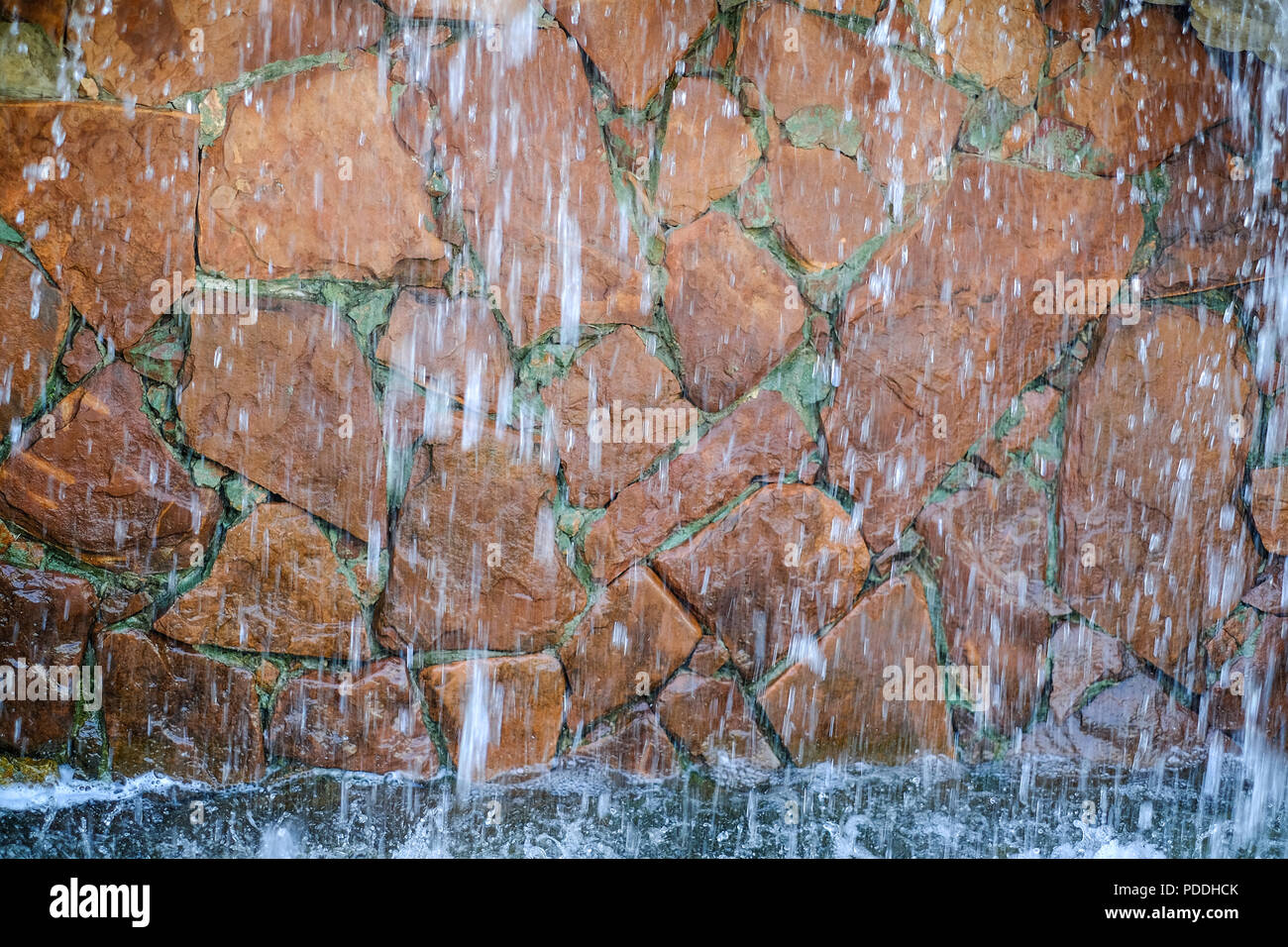 Waterfall in landscape design decorated with natural natural stone ...