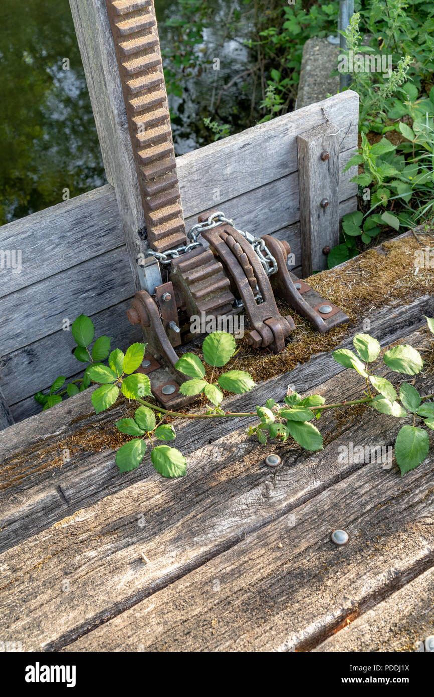Ratchet for raising and lowering a small river lock gate with a bramble ...