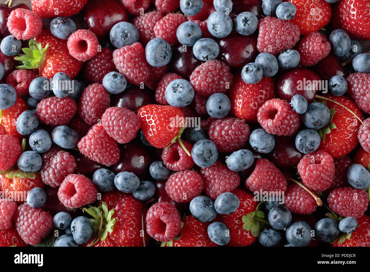 Berries closeup colorful assorted mix of strawberry, blueberry ...