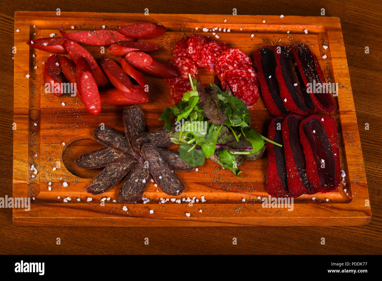 Sausages plate mix snack Stock Photo - Alamy