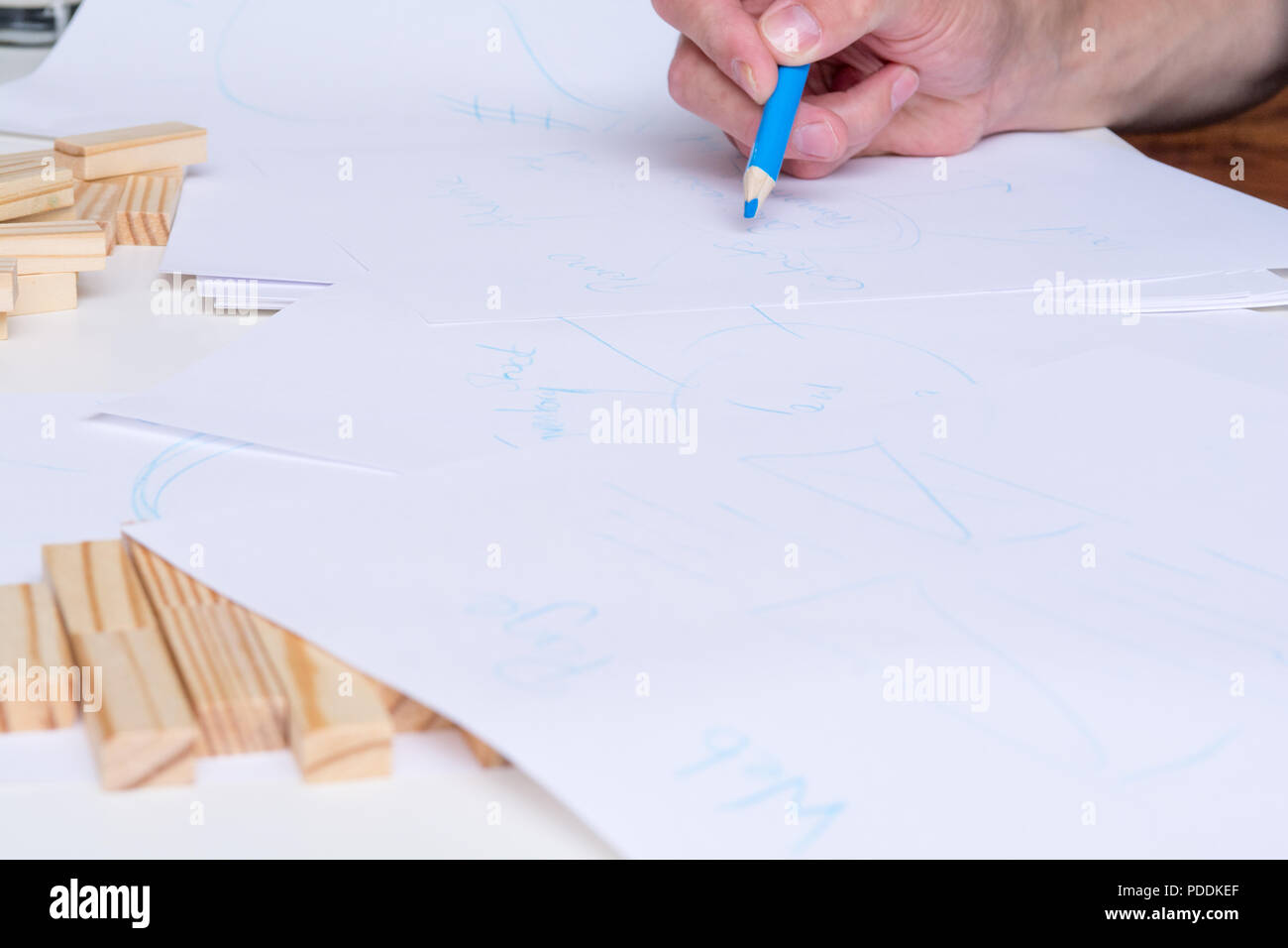 Brainstorming an new business idea with pencil and paper Stock Photo ...