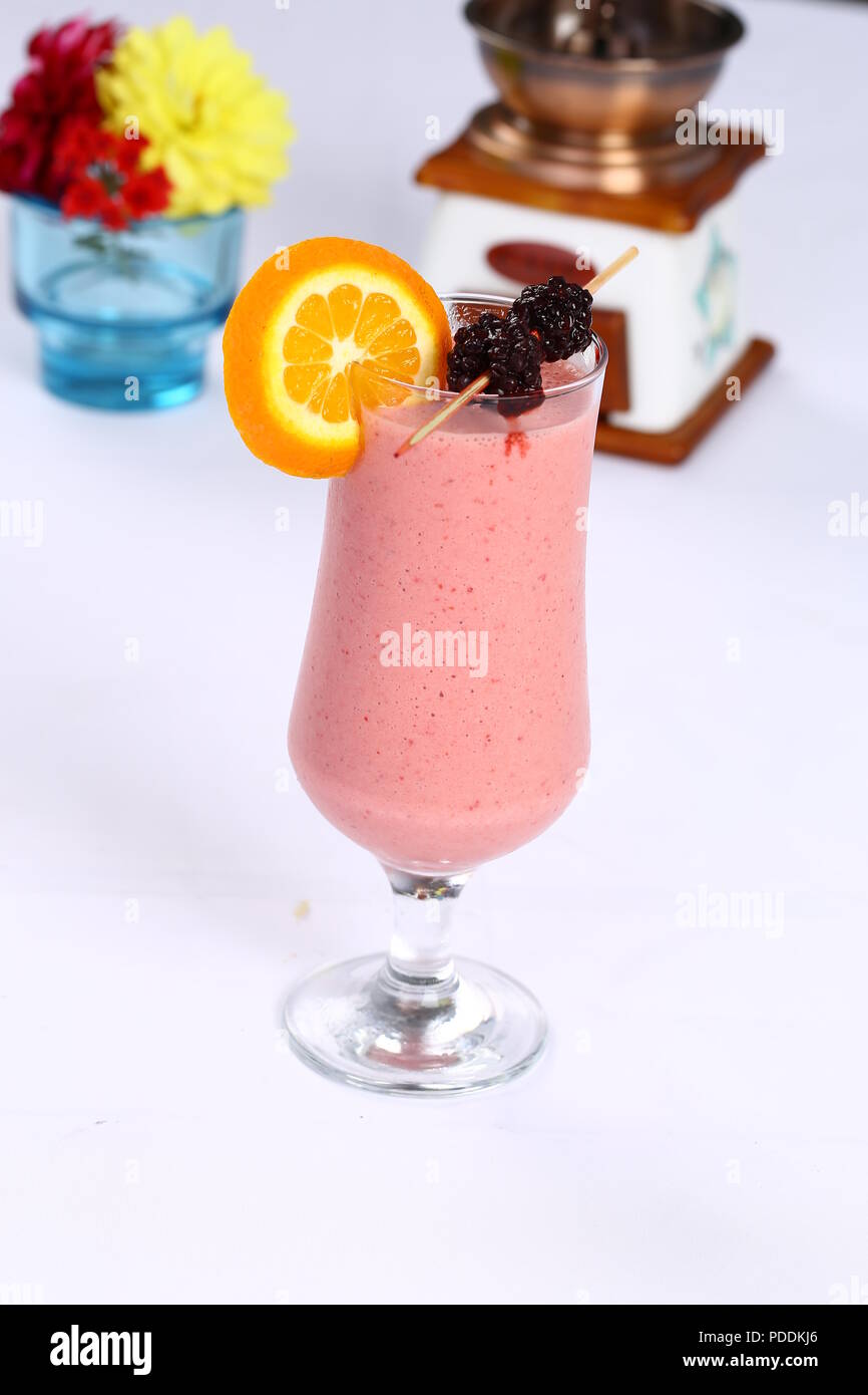 Strawberry Milkshake cocktail with whipped cream Stock Photo - Alamy