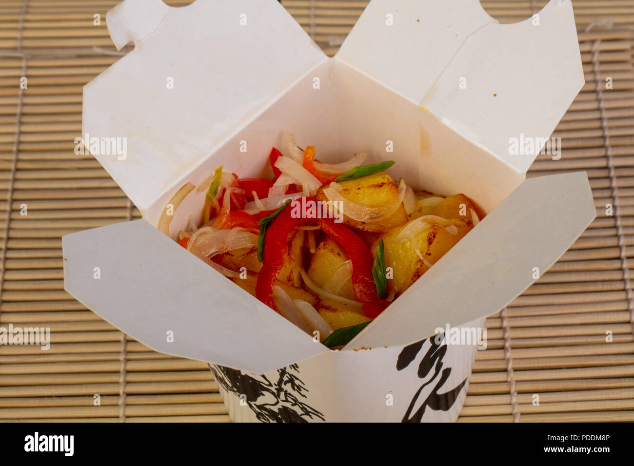 Delicious box of fried potatoes Stock Photo - Alamy
