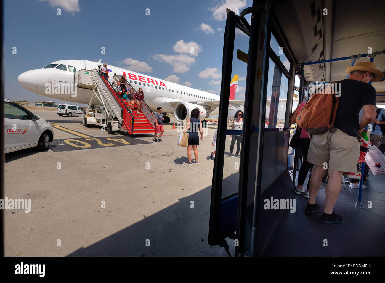 Plane disembarking hi-res stock photography and images - Alamy