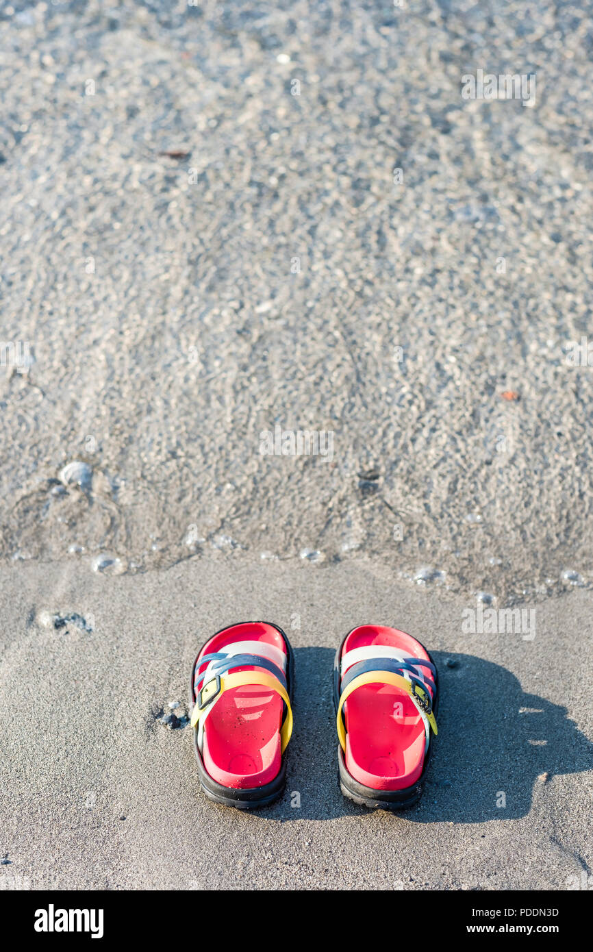 slippers on the beach Stock Photo - Alamy