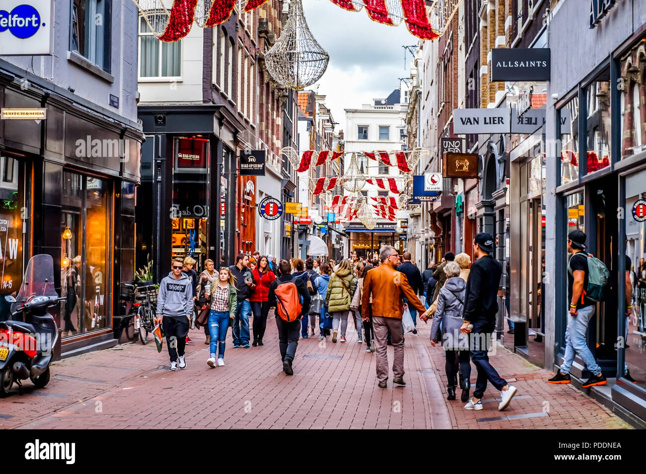 The busy Kalverstraat, a famous and touristic shopping street in the ...