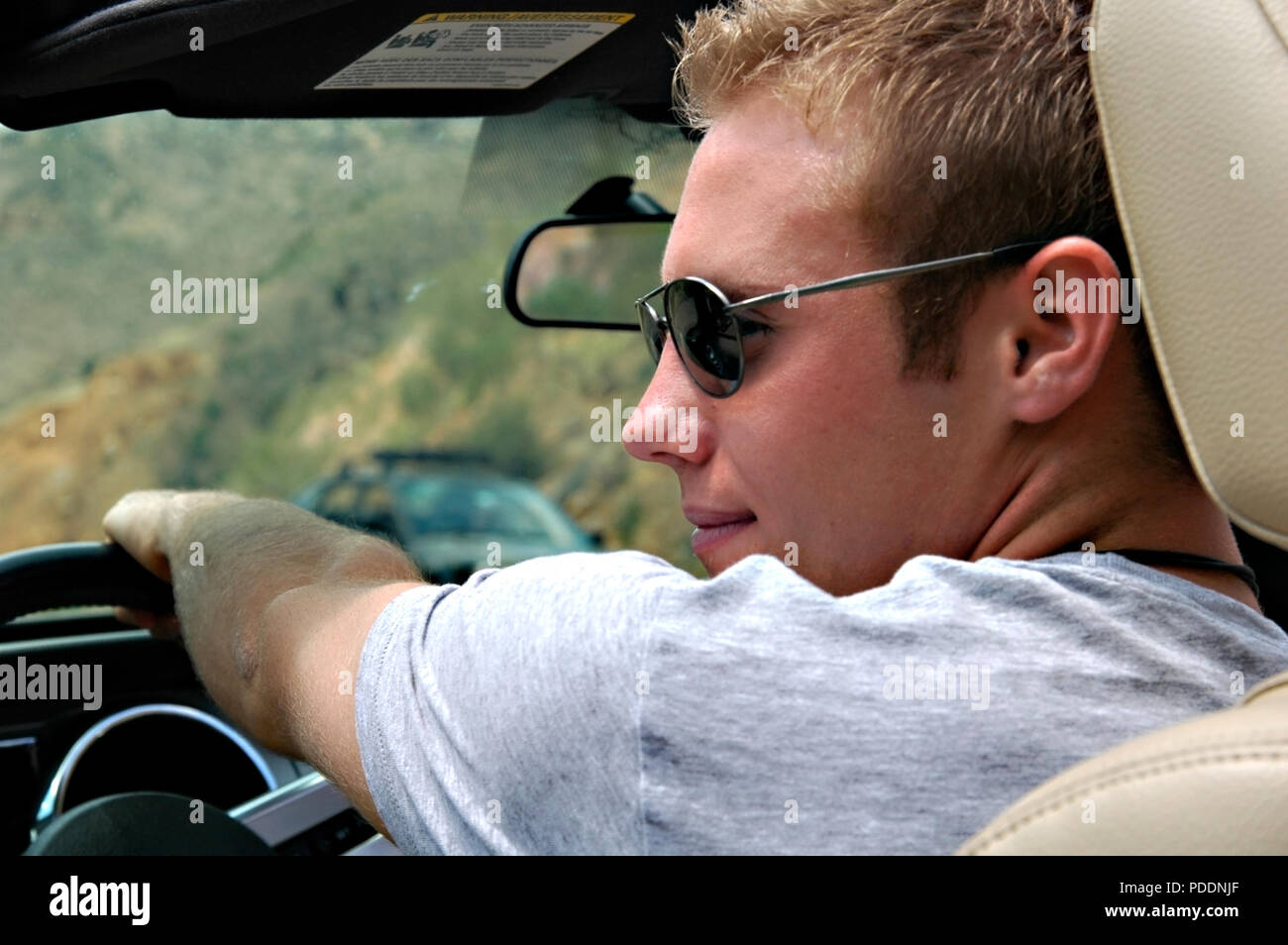 Driving a convertable hi-res stock photography and images - Alamy