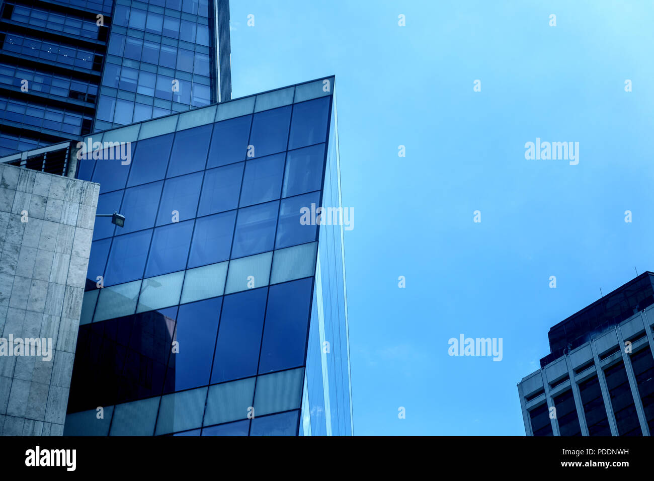 Bottom up view of Modern office building Stock Photo - Alamy