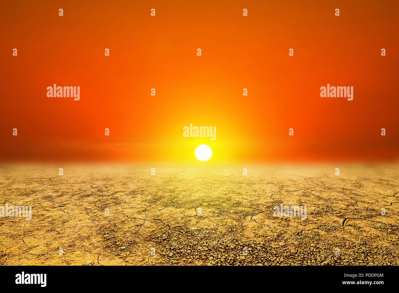 sunset among a dry land Stock Photo - Alamy