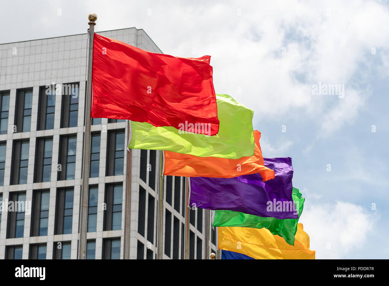 Flying rainbow flags from pole hi-res stock photography and images - Alamy