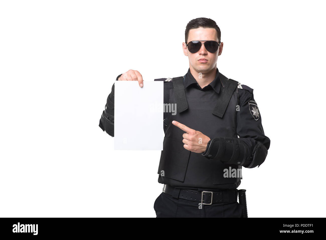 Cop in sunglasses points to empty piece of paper Stock Photo - Alamy