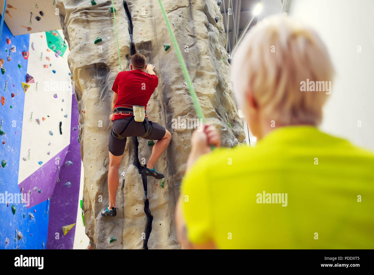 Athlete climbing wall hi-res stock photography and images - Alamy