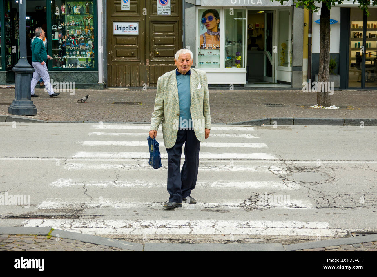 Man crossing street in Naples Italy Stock Photo - Alamy