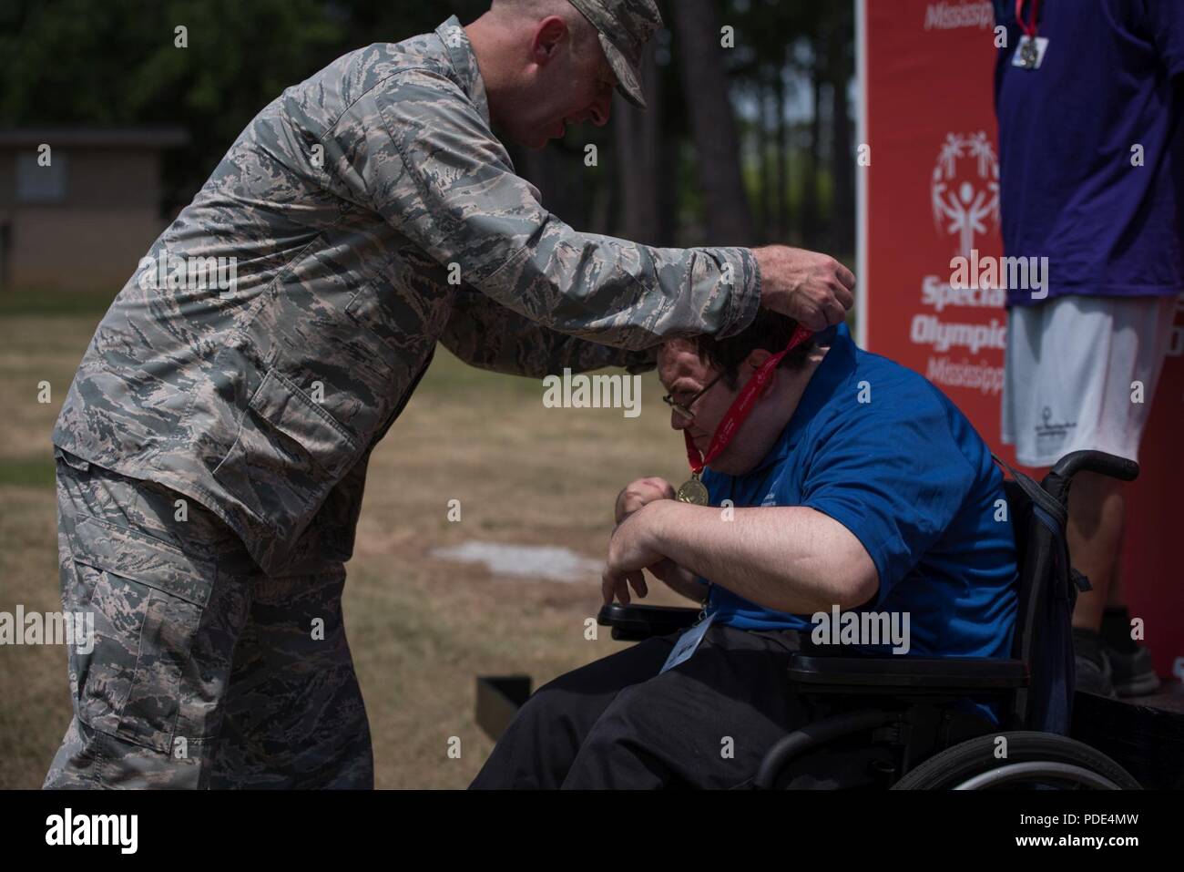 Col. Danny Davis, 81st Mission Support Group commander presents a medal ...
