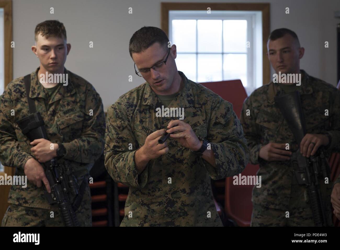 U.S. Marine Sgt. Derek R. Rush, marksmanship coach with Headquarters ...