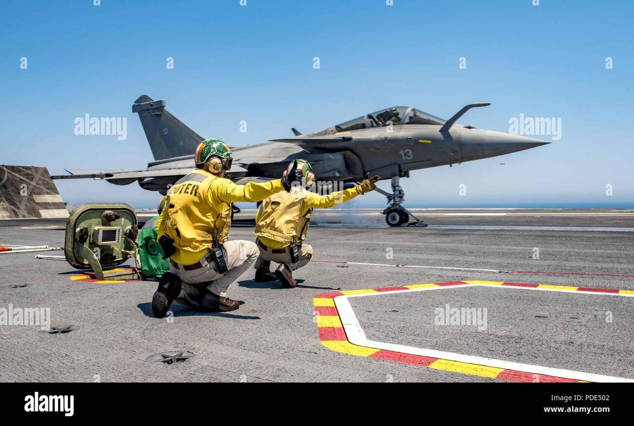 ATLANTIC OCEAN (May 12, 2018) Lt. Ty Fritz, right, from Easton ...