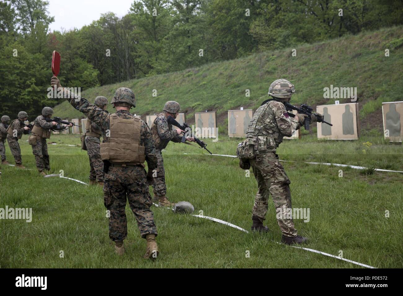 U.S. Marine Sgt. John R. Sheets, range coach with Inspector Instructor ...