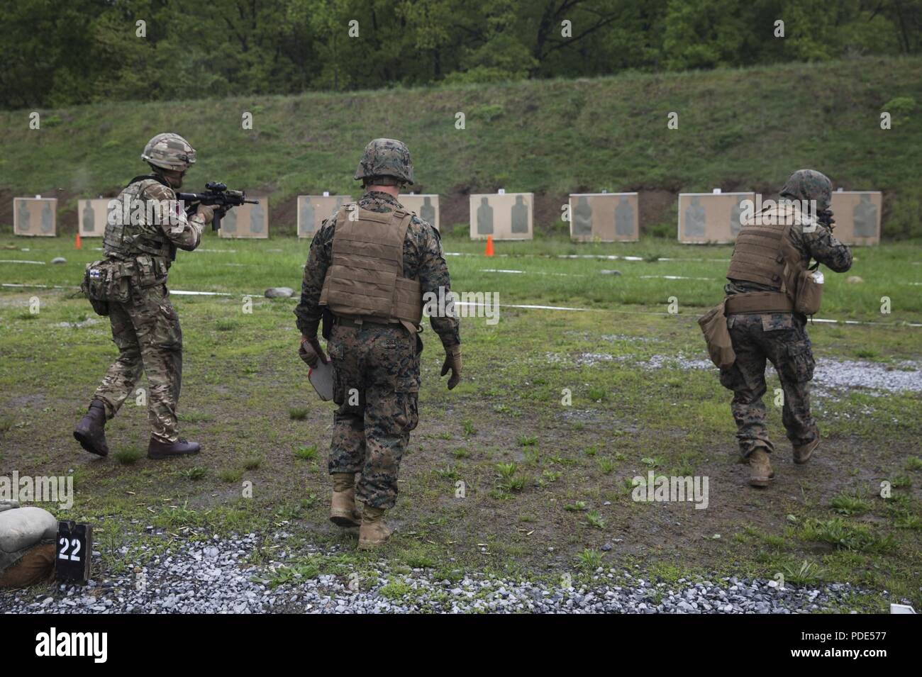 U.S. Marine Sgt. John R. Sheets, range coach with Inspector Instructor ...