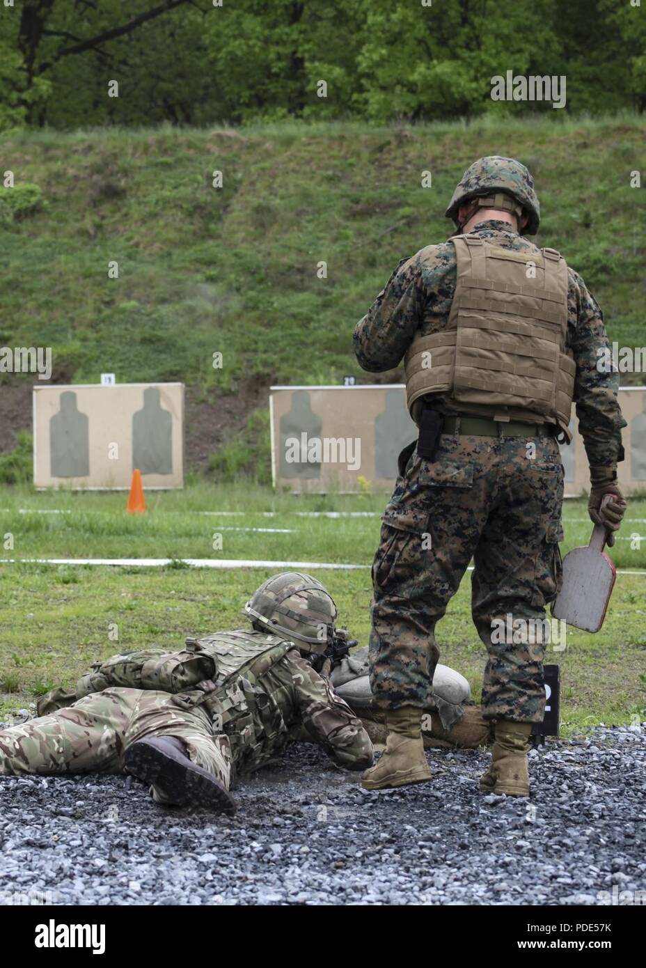 U.S. Marine Sgt. John R. Sheets, range coach with Inspector Instructor ...