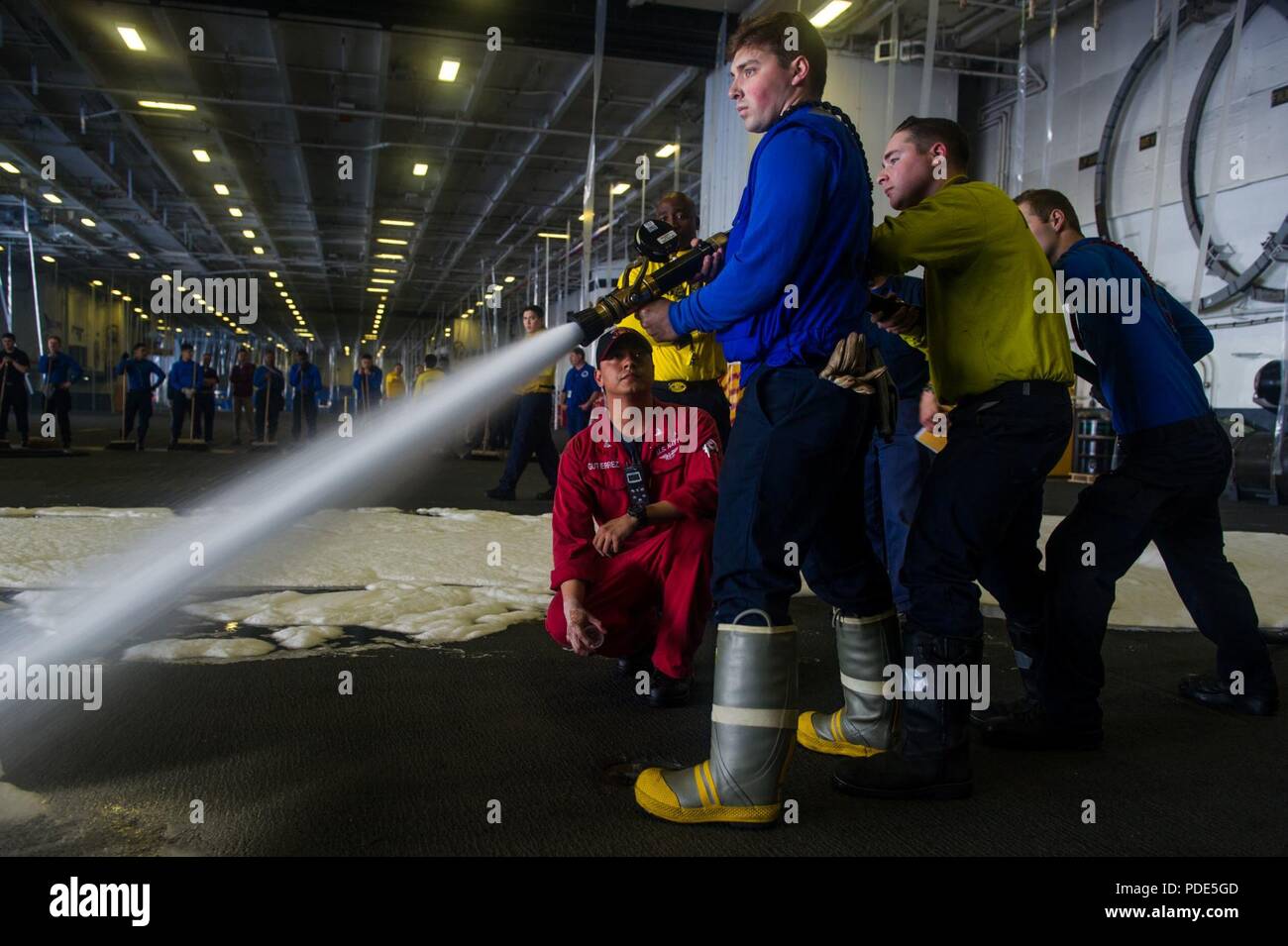 WATERS SOUTH OF JAPAN (May 13, 2018) Sailors perform an aqueous film ...