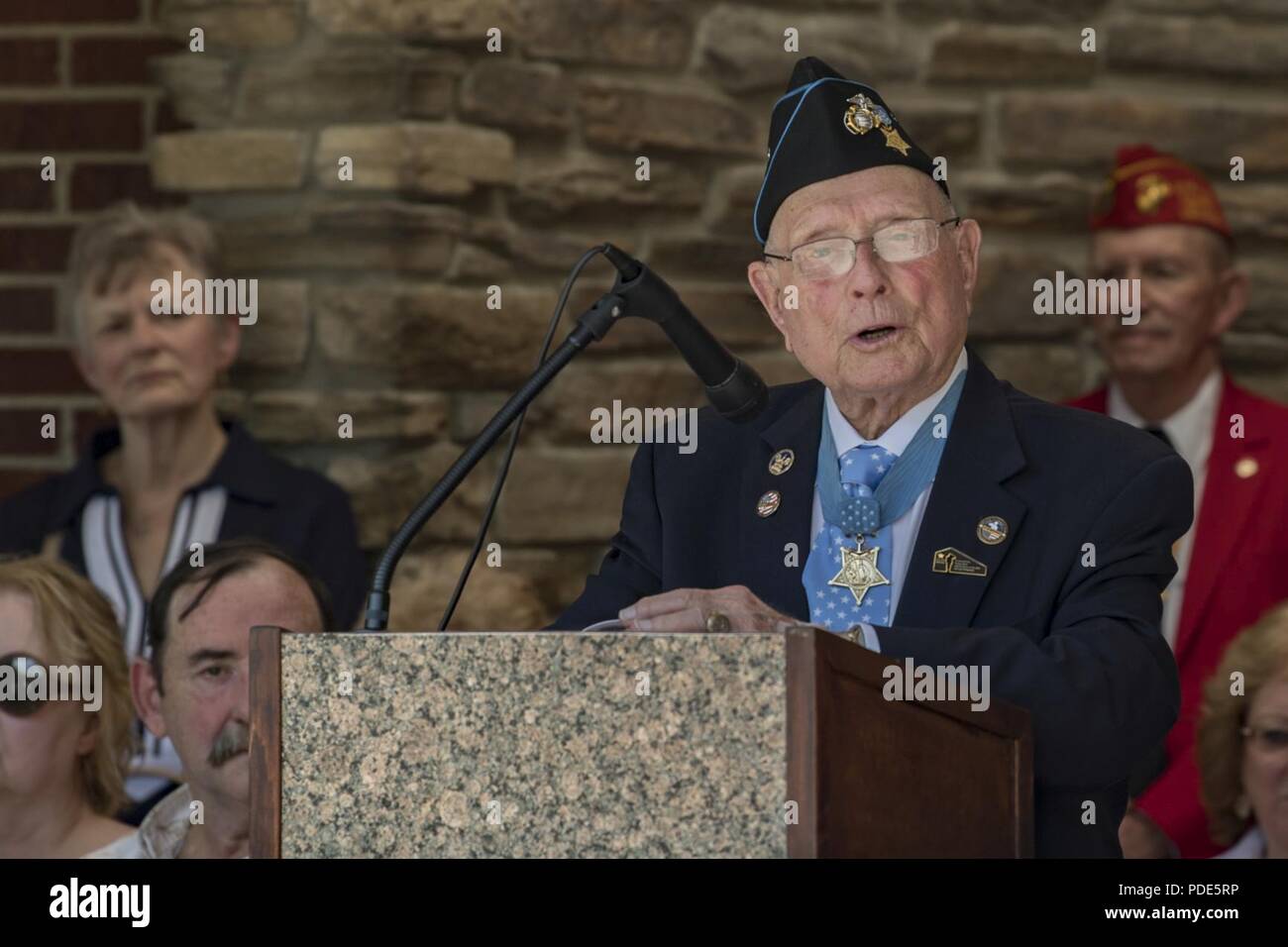 Herschel “Woody” Williams, a Medal of Honor recipient himself, gives a ...