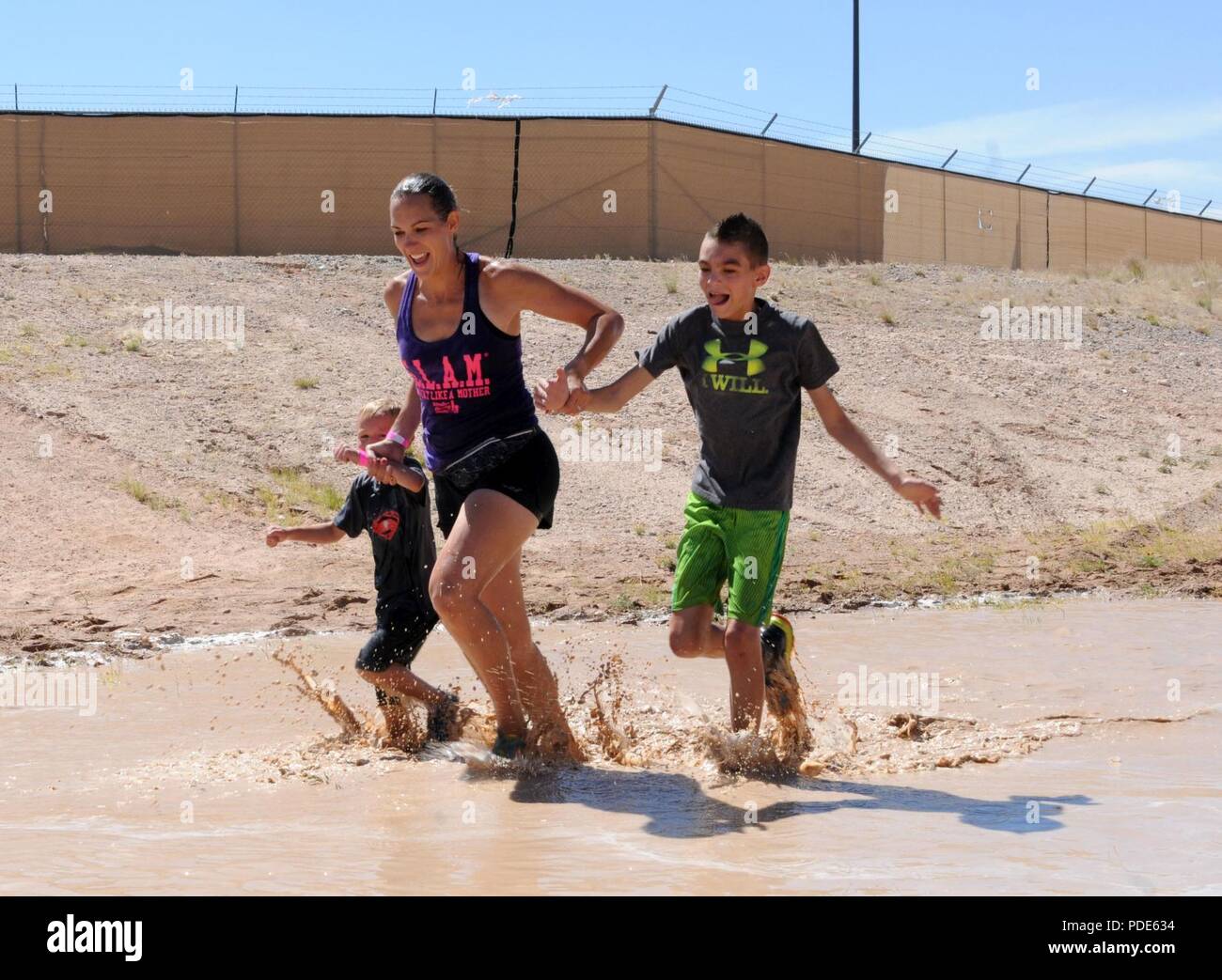 Obstacle course children mud hi-res stock photography and images - Alamy