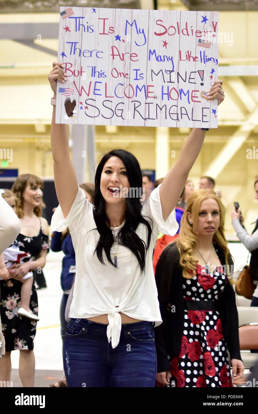 Brittany Rimgale looks for her husband, Staff Sgt. Tim Rimgale, among ...