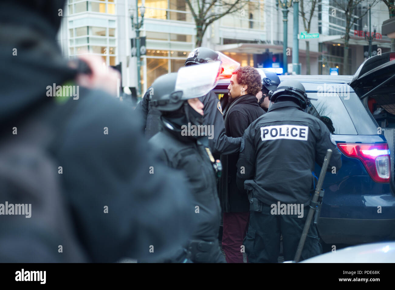 PORTLAND, OREGON JANUARY 25 2017, A man getting arrested during ...