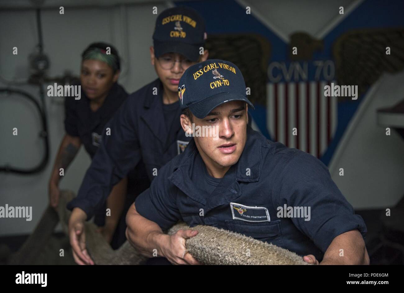 SAN DIEGO (May 14, 2018) Sailors heave in a mooring line in the fo’c ...