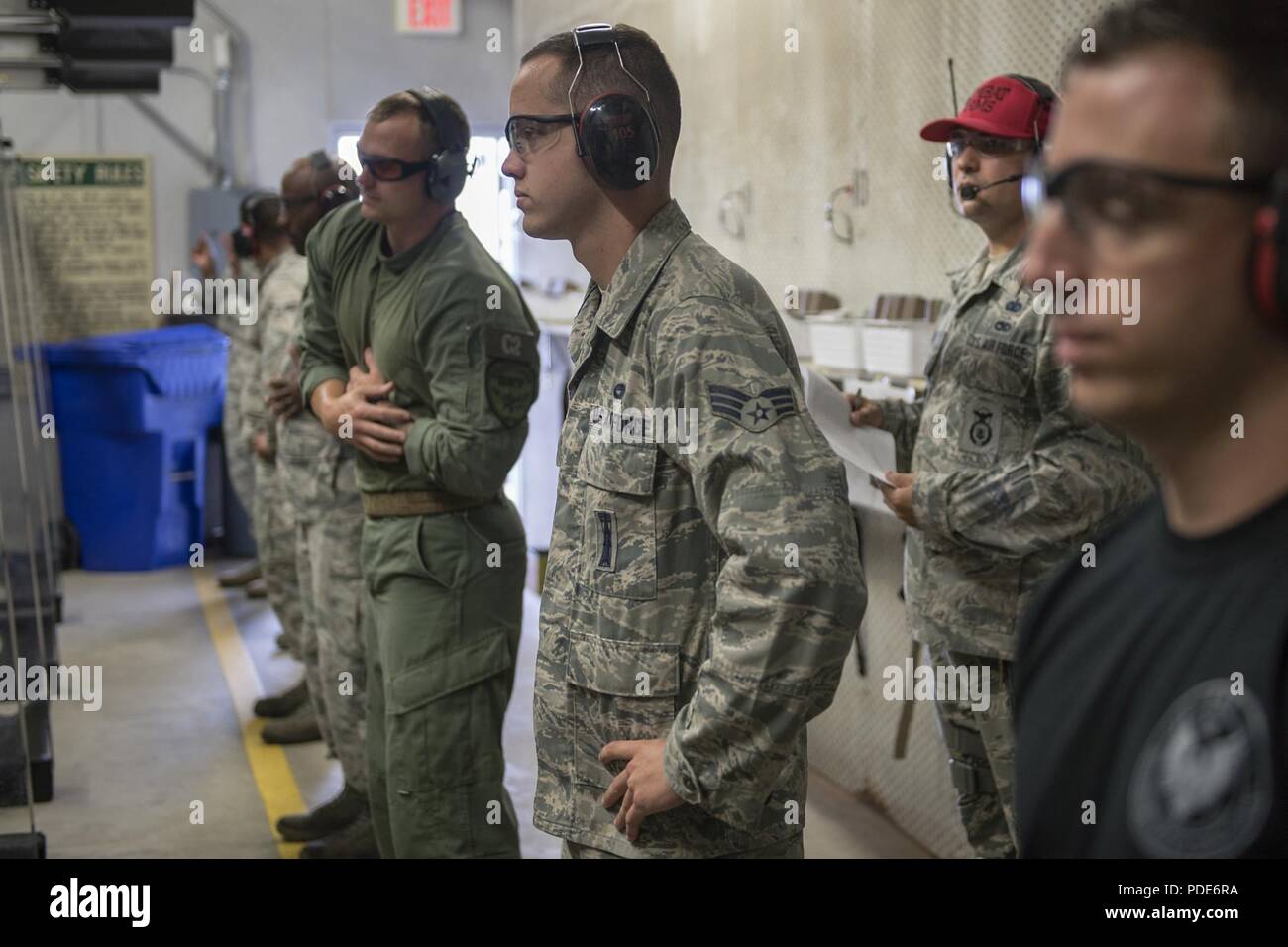 Shooters wait for instructions May 15, 2018, at the 4th Security Forces Squadron combat arms ...