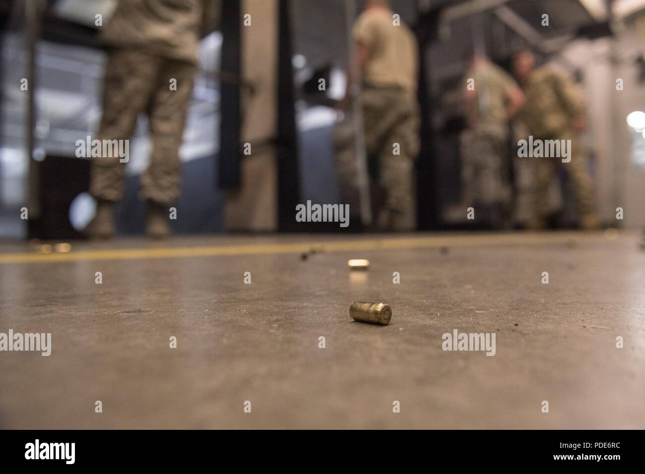 Expelled brass rounds on the ground May 15, 2018, at the 4th Security ...