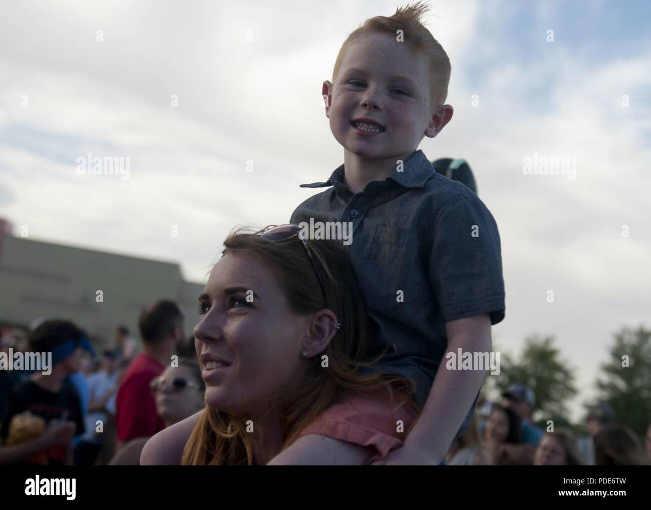 Melanie Weiler and her son watches country singer Lindsay Ell as she ...