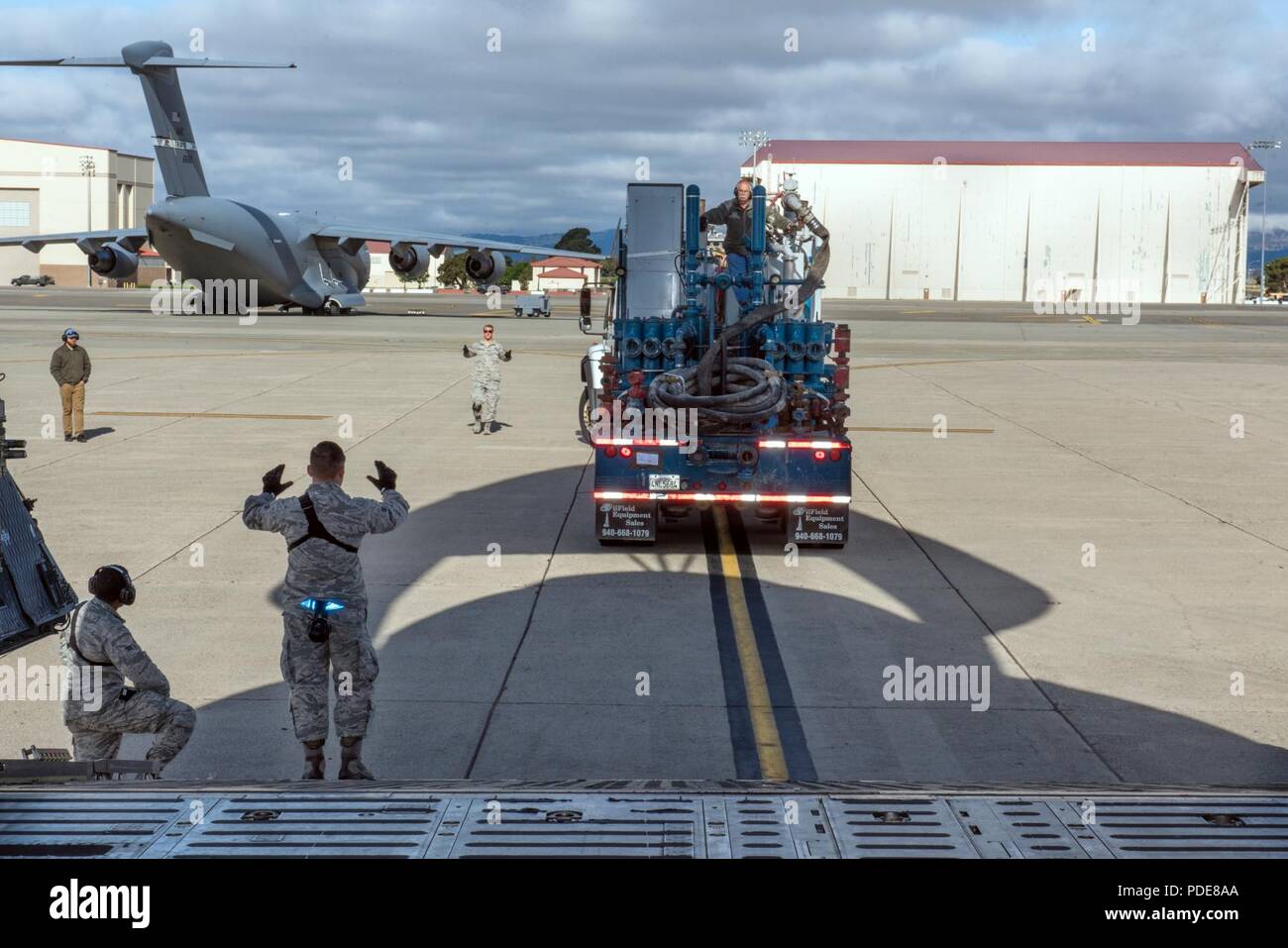 60th Aerial Port Squadron Airmen load a double recirculating cement ...