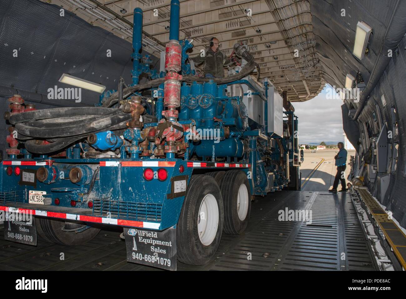 60th Aerial Port Squadron Airmen load a double recirculating cement ...