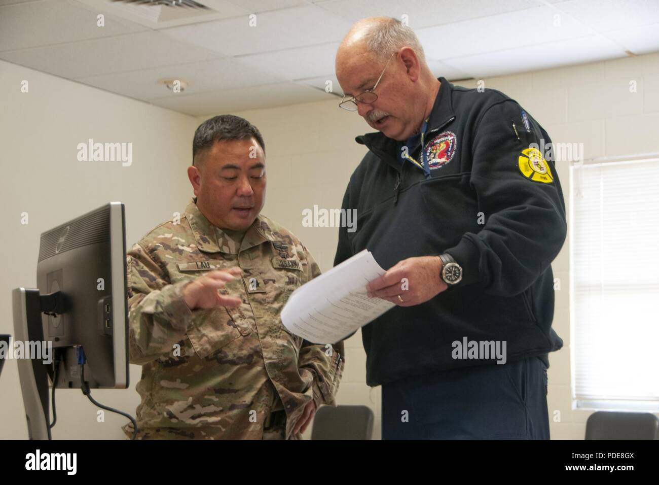 Lt. Col. Robin Lau, from Detachment 1, Charlie Co. 207th Aviation of ...