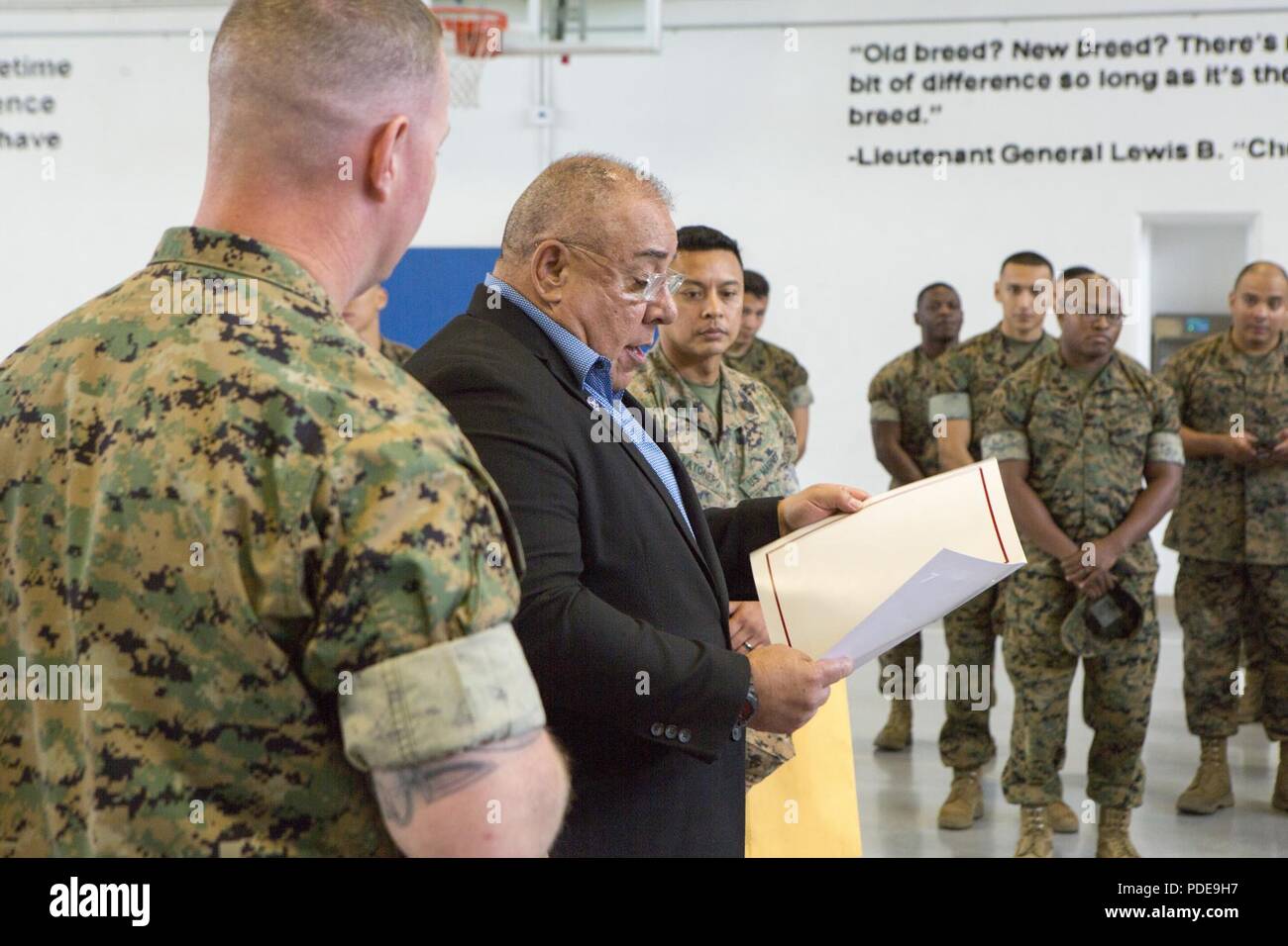 William Barnickel, commissioner of San Francisco Veterans Affairs, reads a Senate citation for ...