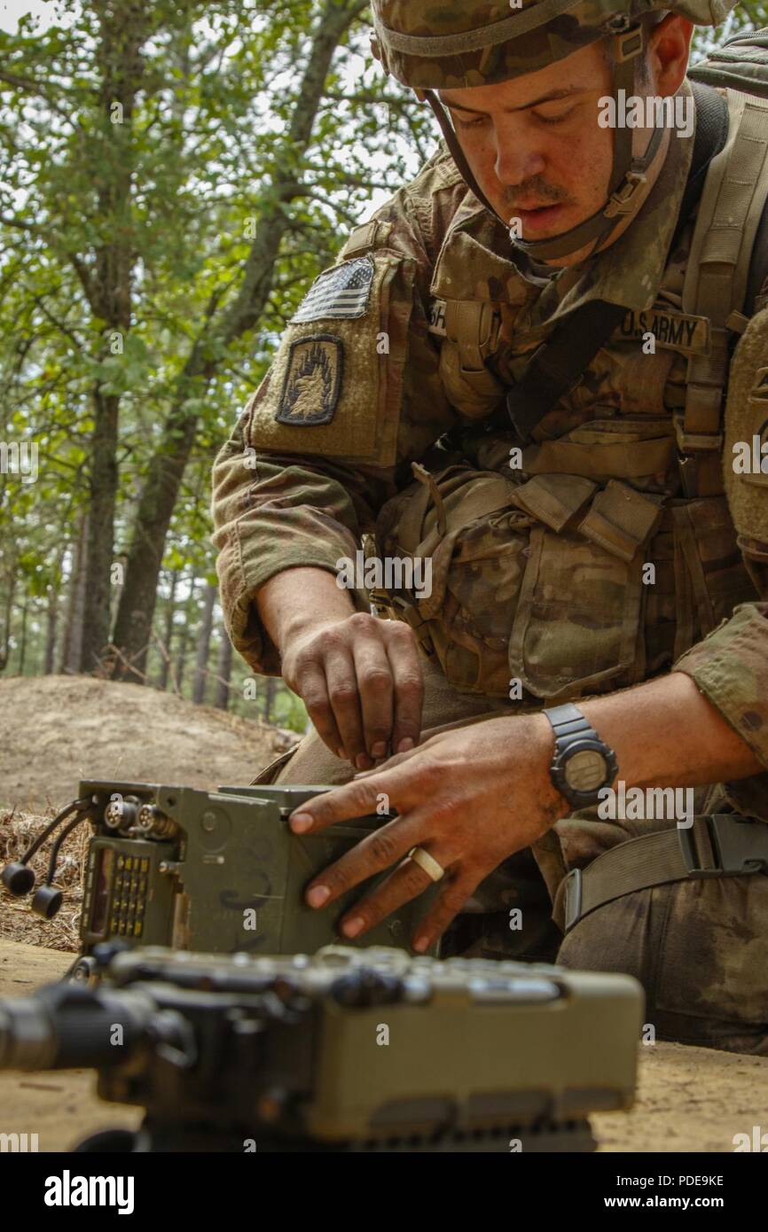 U.S. Army Sgt. Mason Olshove, a flight medic assigned to Charlie ...