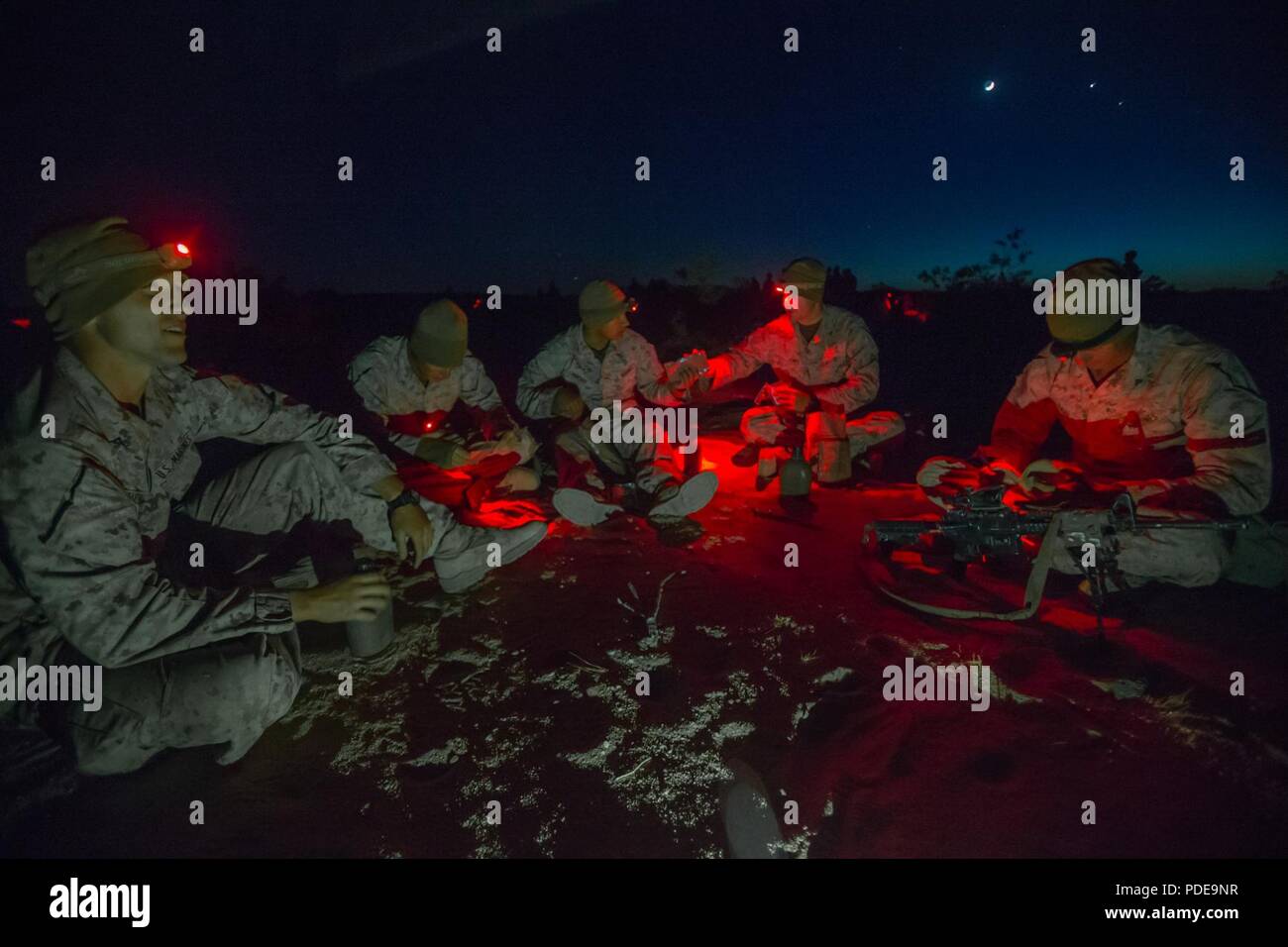 U.S. Marines with 3rd Battalion, 4th Marines, 7th Marine Regiment, eat ...