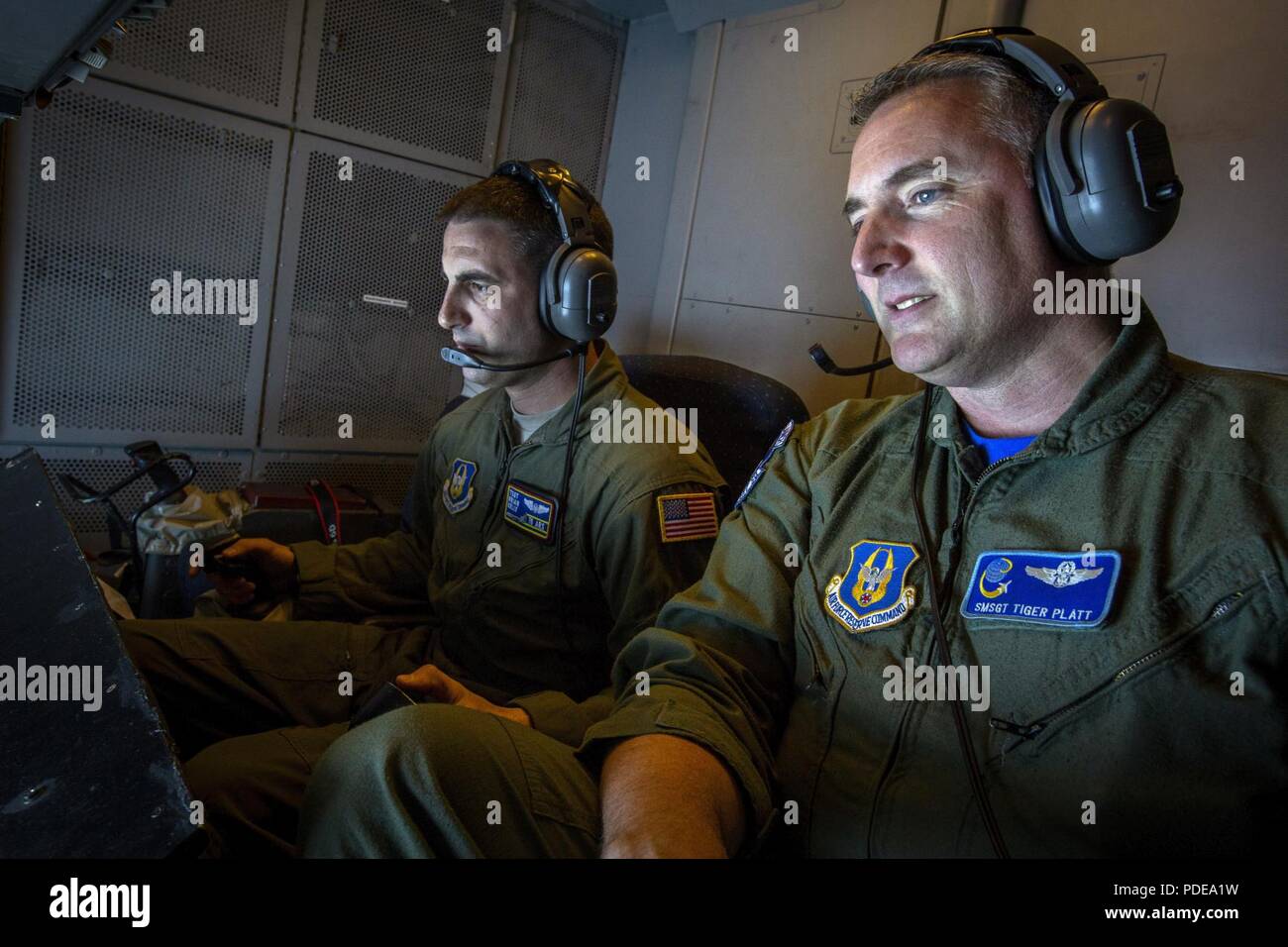 U.S. Air Force Senior Master Sgt. Tige E. Platt, right, a KC-10 ...