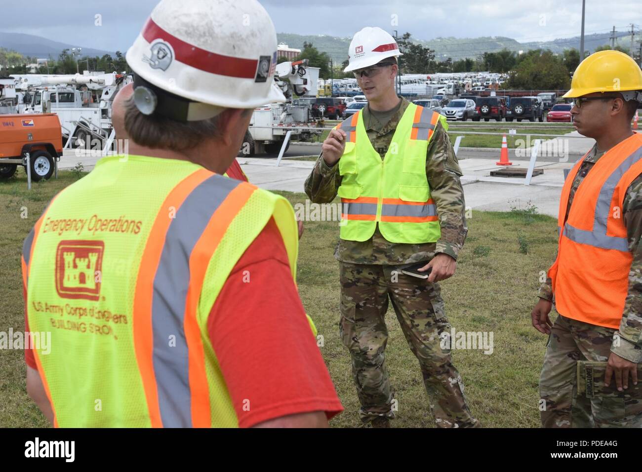 CAGUAS, Puerto Rico – Capt. Andrew Clark speaks to USACE employees at a ...
