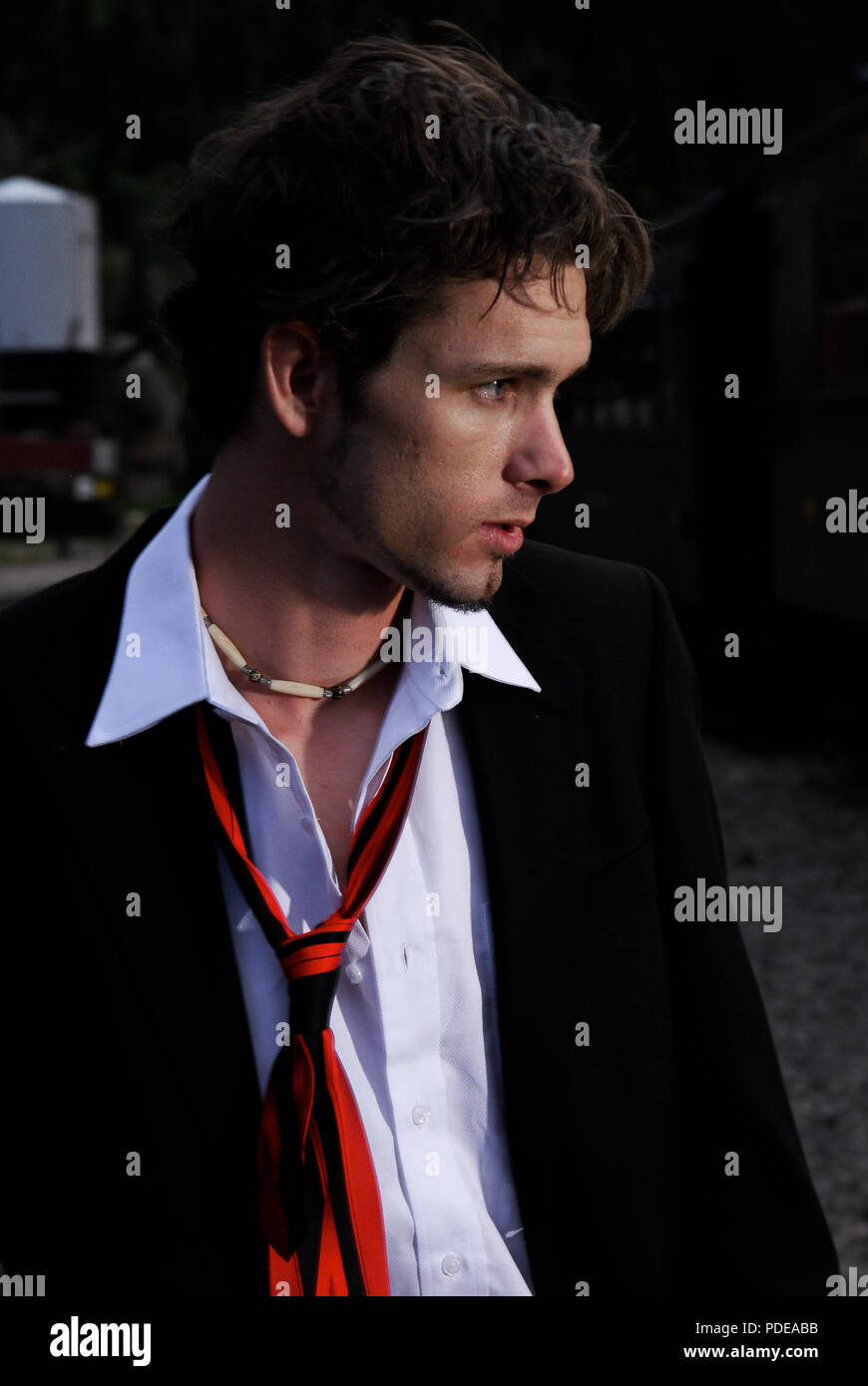 Disheveled man suit hi-res stock photography and images - Alamy