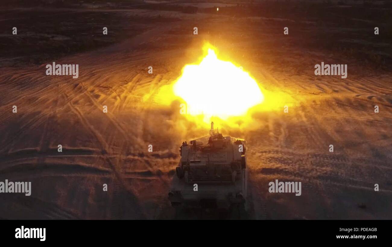 Marines with Bravo Company, 4th Tanks Battalion, fire a M1A1 Abrams ...